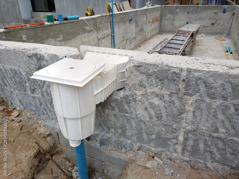 Swimming pool construction.Installing the Skimmer System. Stock Photo ...