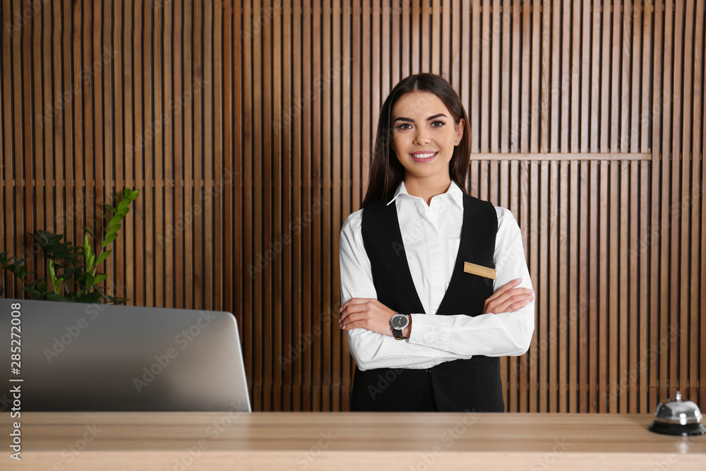 Portrait of receptionist at desk in lobby Stock Photo | Adobe Stock