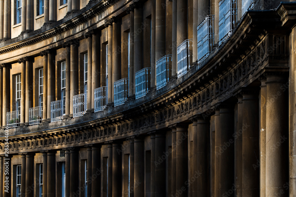 Long shot of the circular street known as the Circus in Bath, England ...