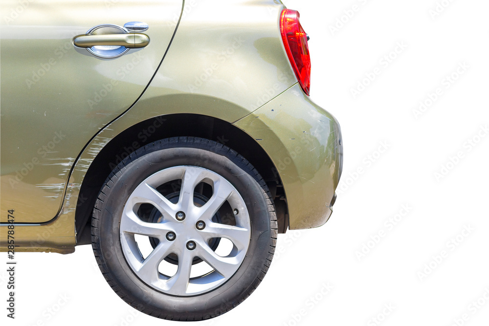 Car crash. Beside the deep green color car have scratch from damage ...