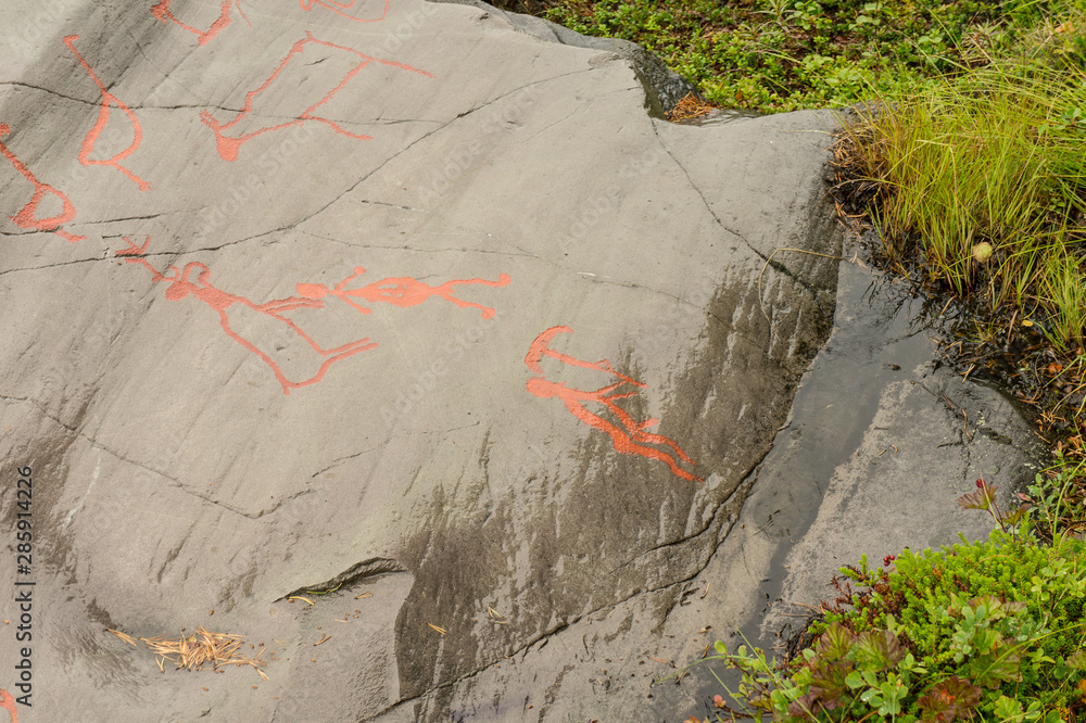 Rock art in Alta Fjord, Norway. Ancient symbols, real drawing, texture ...