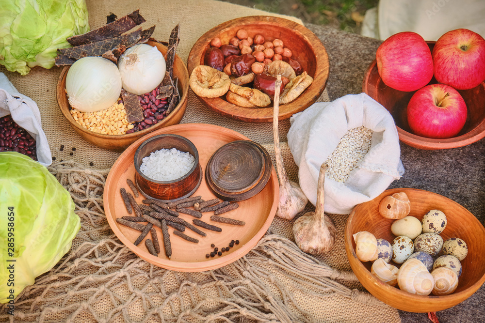 The food of the ancient Romans on the table, reconstruction. Salt ...