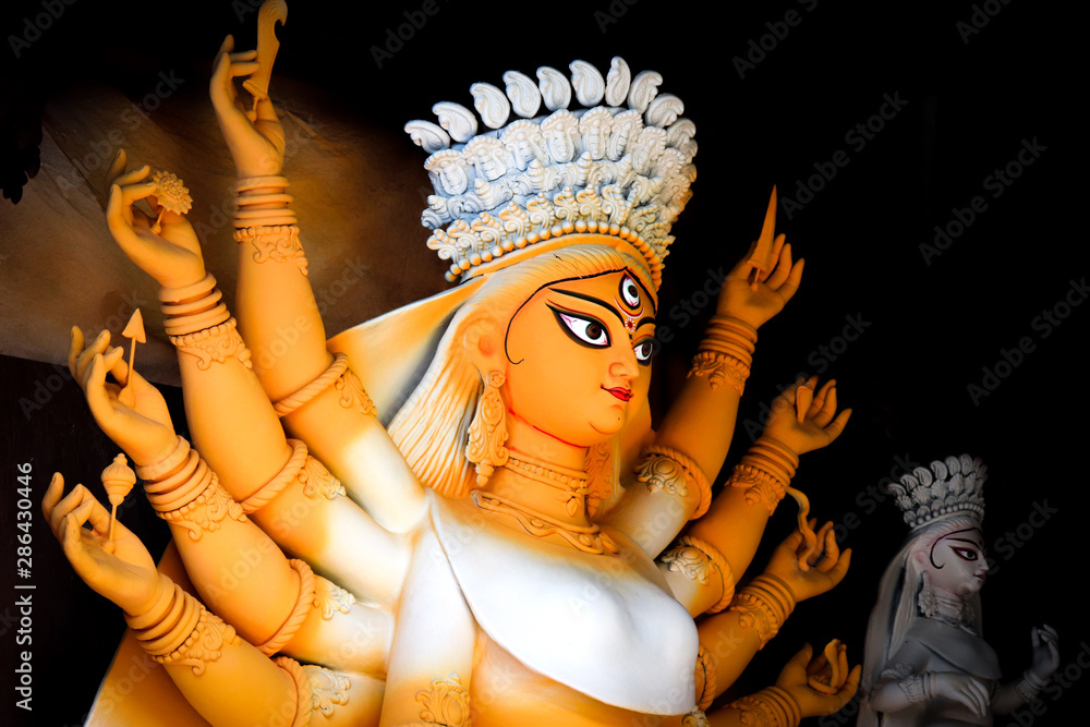 Making of goddess Durga idol at Kumortuli. These idols are made for ...