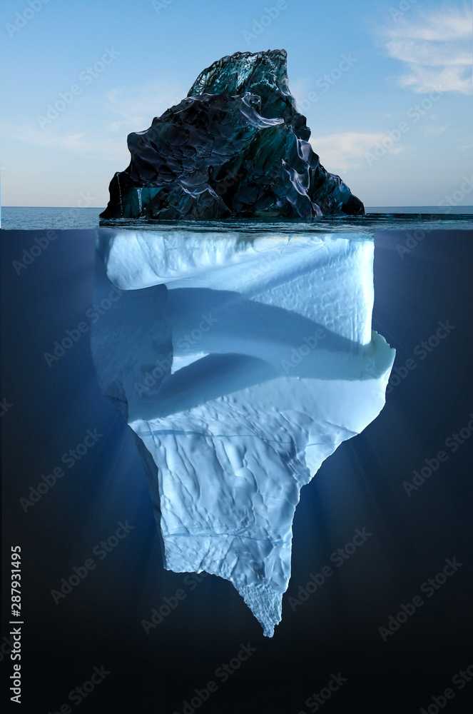 Iceberg floating in the ocean, both the tip and the submerged parts are ...