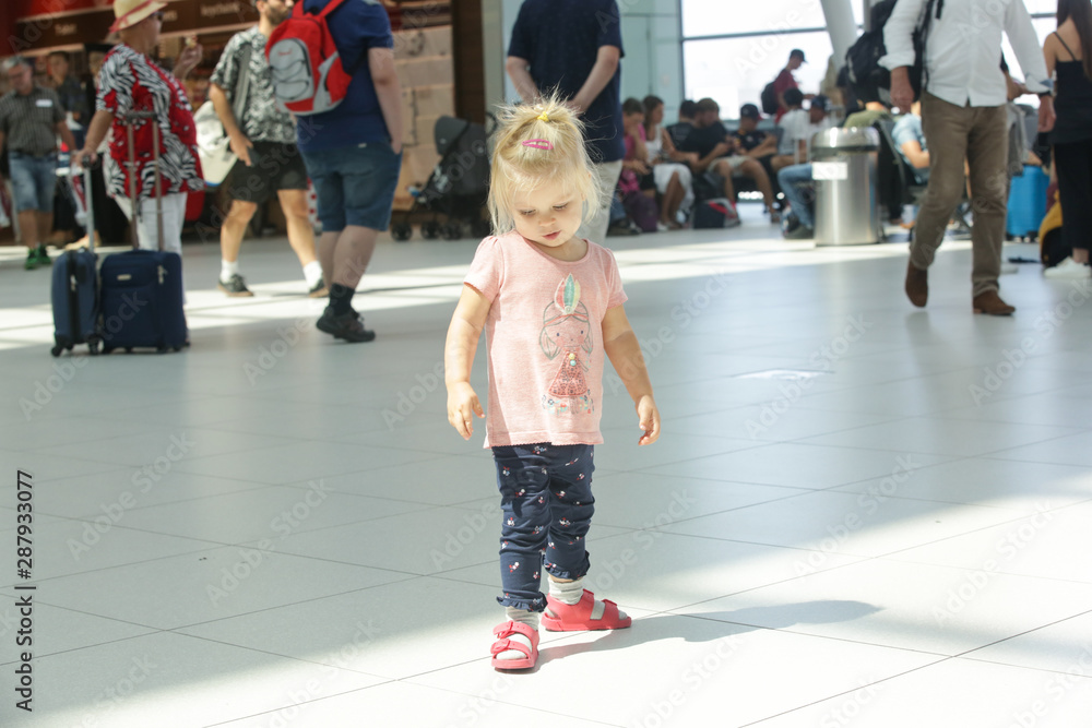 Child lost at the airport or shopping mall, little girl looking for her ...