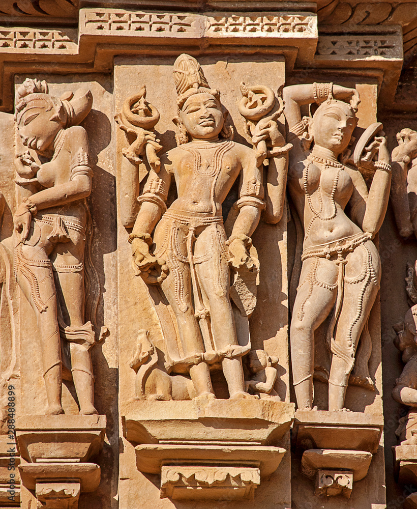 Стоковое фото «Sculptures on the walls of famous Khajuraho Temples in ...
