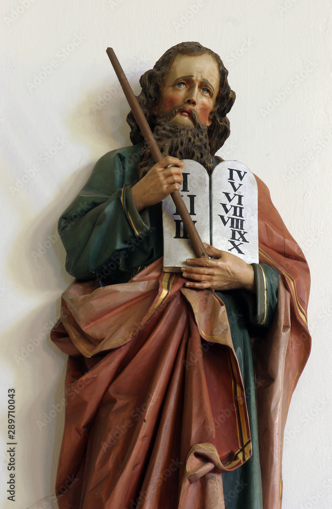 Moses holding the Ten Commandments Stock Photo | Adobe Stock