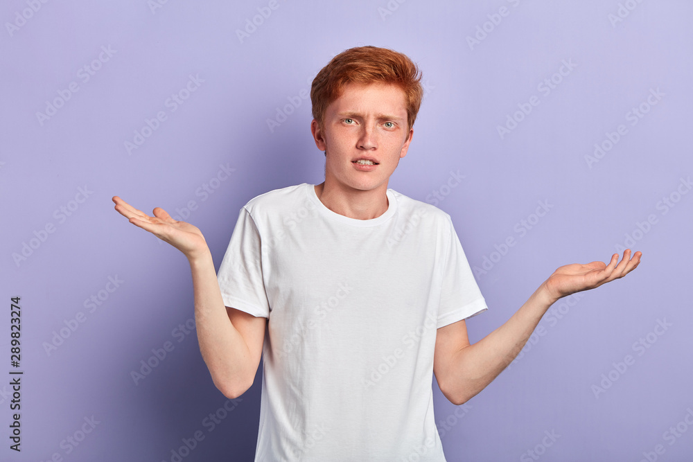 young man cannot believe in news, guy showing ignorance on a blue ...
