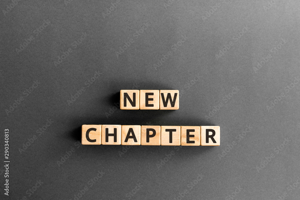 new chapter - words from wooden blocks with letters, starting new life ...
