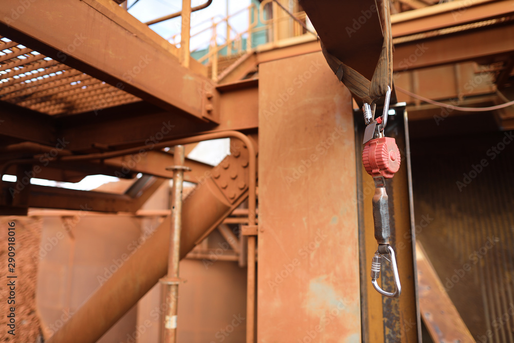 Photo Stock Isolated personal fall arrest safety retraceable device ...