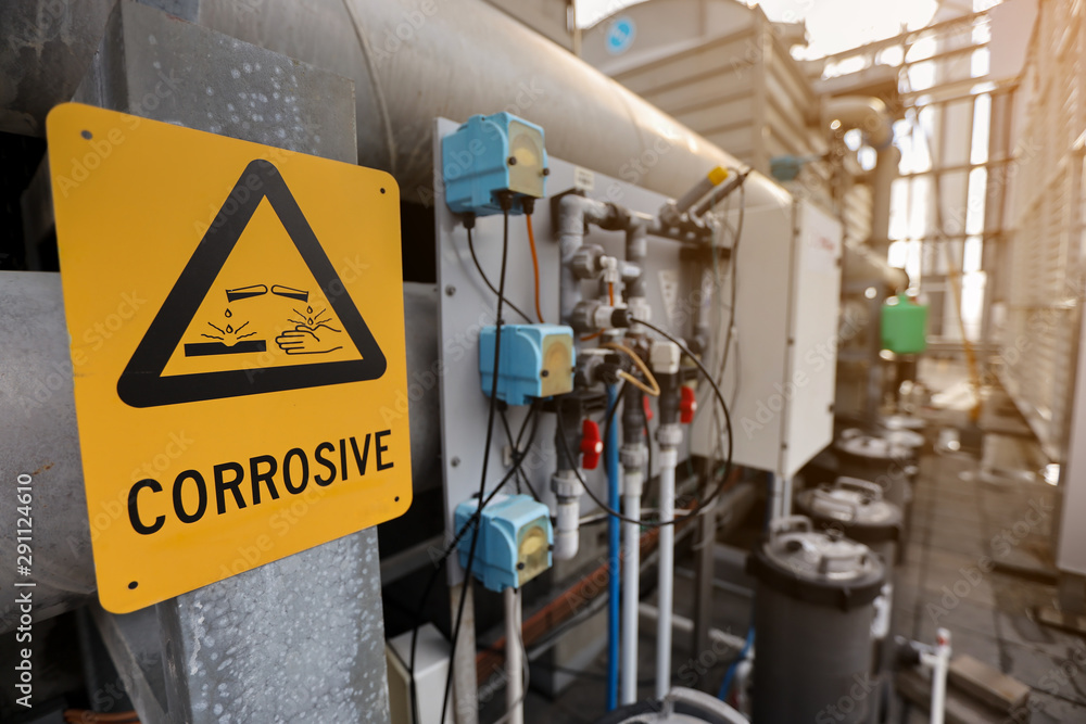 Dangerous corrosive warning signs and symbol applying where chemical ...