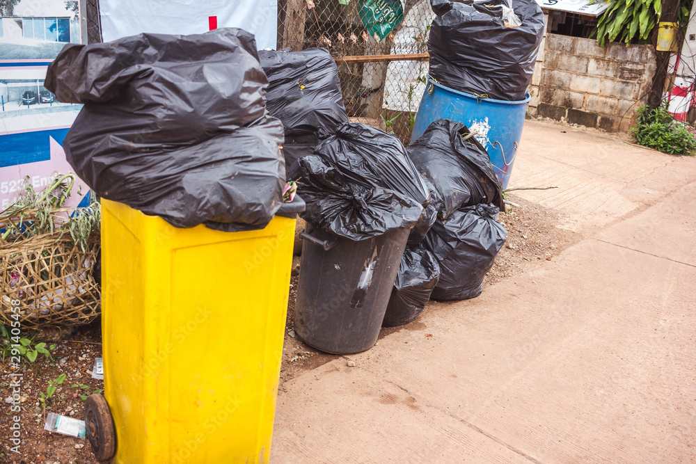Trash and piles of garbage on the street Stock Photo | Adobe Stock