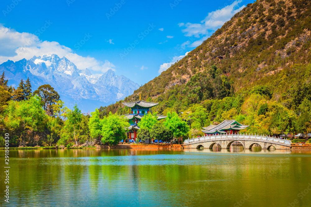 Heilongtan Pool (Black Dragon Pool) with marble bridge and Jade dragon ...