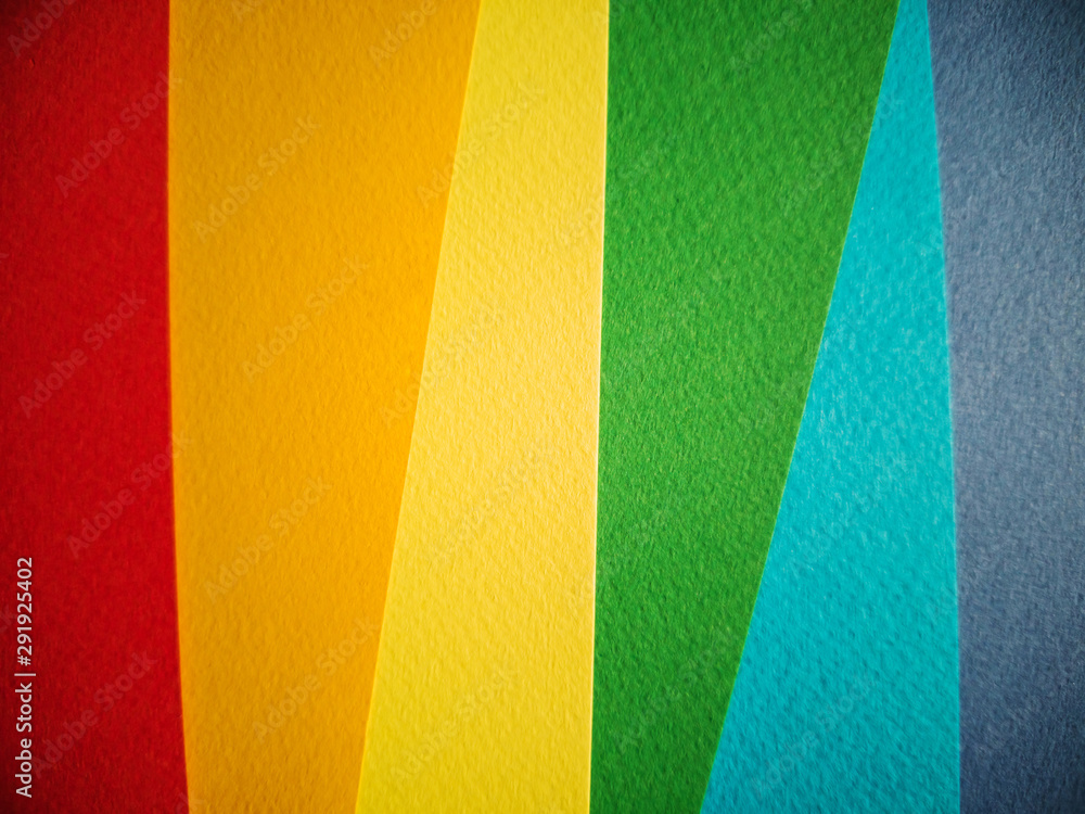 Background in the colors of the LGBT flag. Texture sheets of paper. Red ...