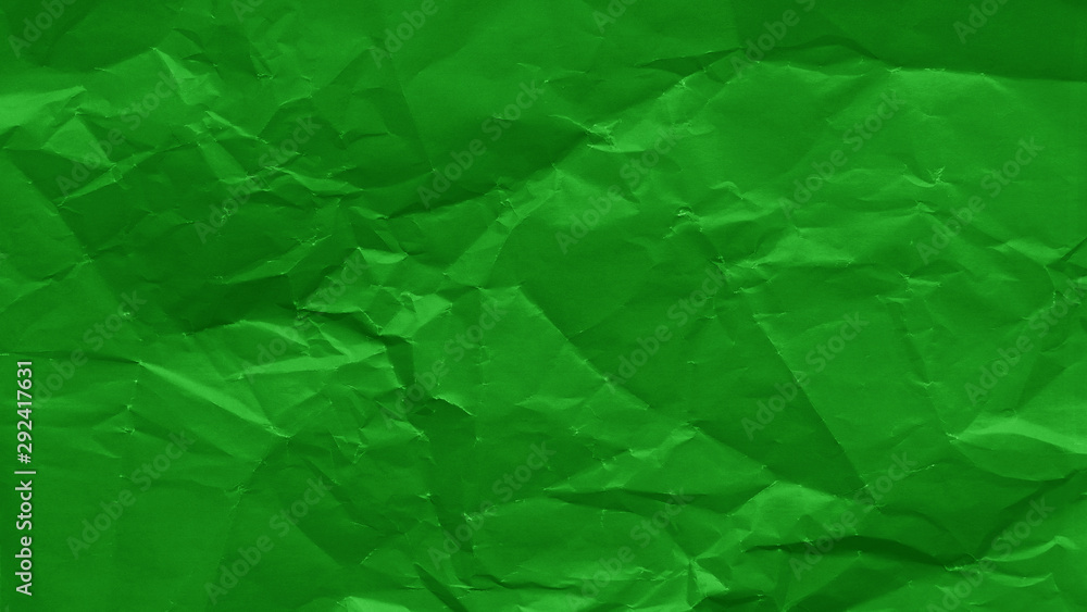 Crumpled sheet of green color paper texture. Wrinkled background Stock ...
