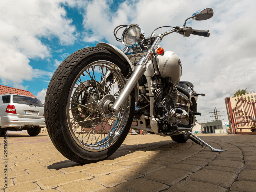 chopper motorcycle shot from the bottom up against a background of ...