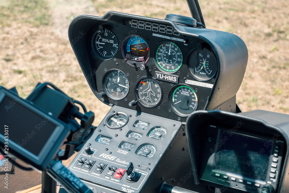 Cockpit control panel dashboard gauges controls of Robinson R66 ...