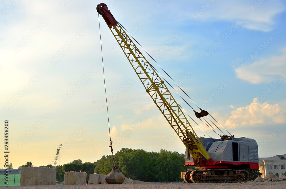 Large crawler crane or dragline excavator with a heavy metal wrecking ...