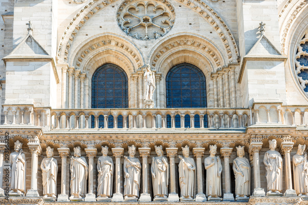 Architectural details on facade of famous cathedral Notre-Dame de Paris ...