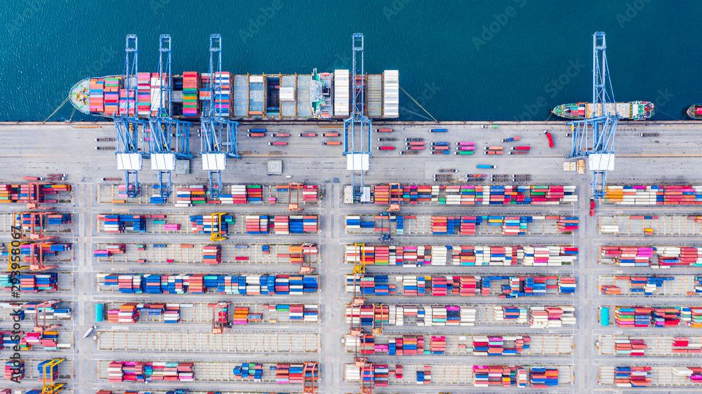 Top view of Deep water port with cargo ship and containers. It is an ...