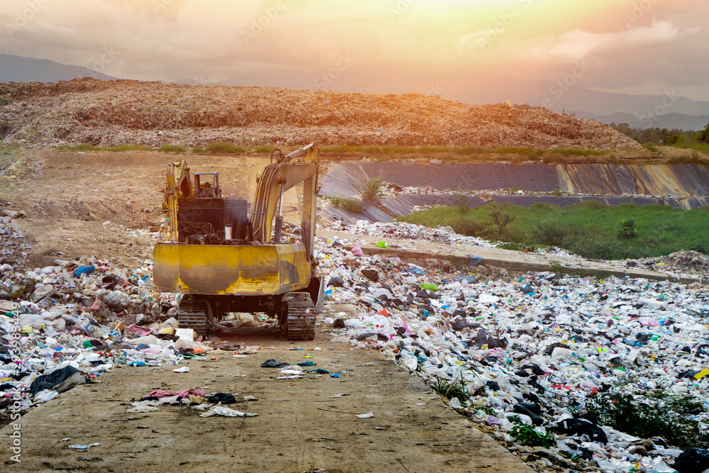 Dig on the garbage Solid waste management Stock Photo | Adobe Stock