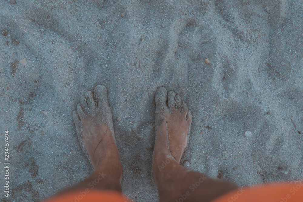 Beach sand under the feet and between toes Stock Photo | Adobe Stock