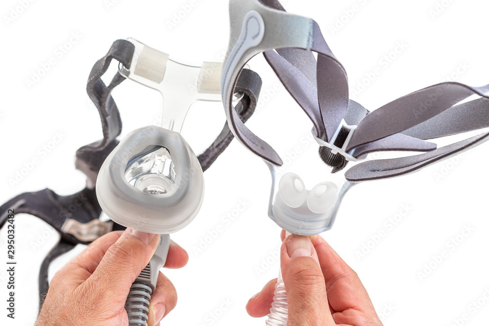 Doctor demonstrating Treatment of sleep apnea and snoring for patient ...