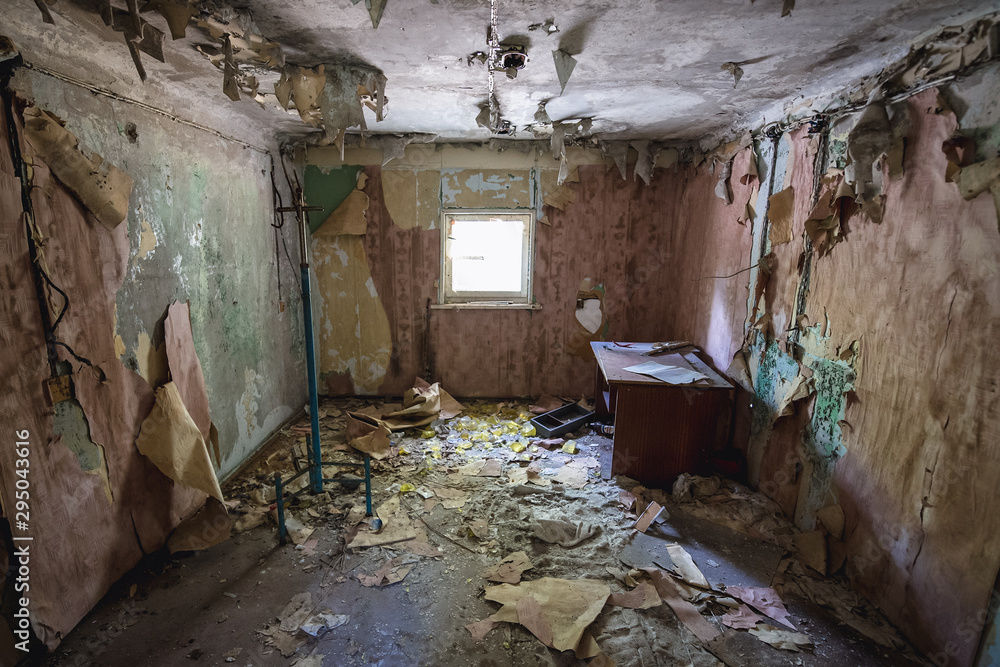 Inside the ruined building of Yaniv railway station near Pripyat city ...
