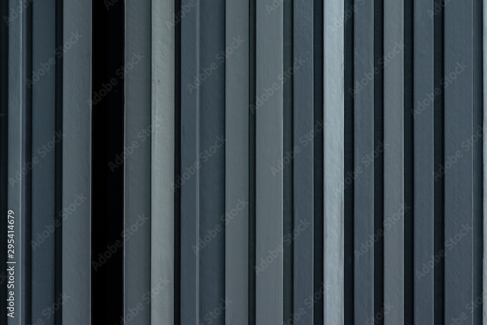Horizontal shot of vertical dark-colored plastic panels texture ...