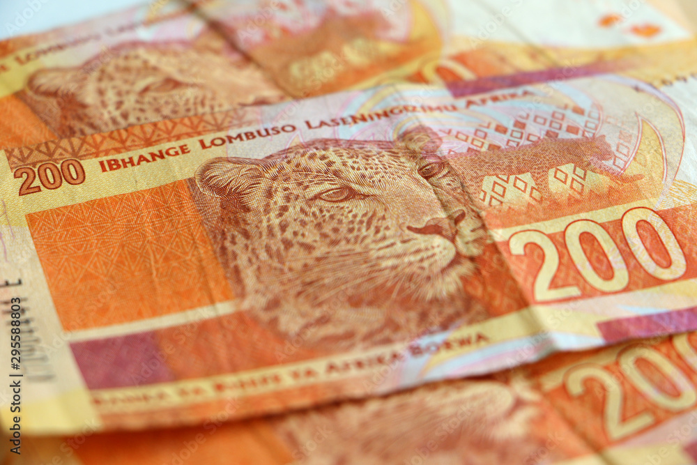 South African money, stacked, piled currency, two hundred rand notes ...