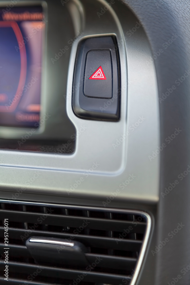 Hazard warning lights, the emergency stop button in the car Stock Photo ...