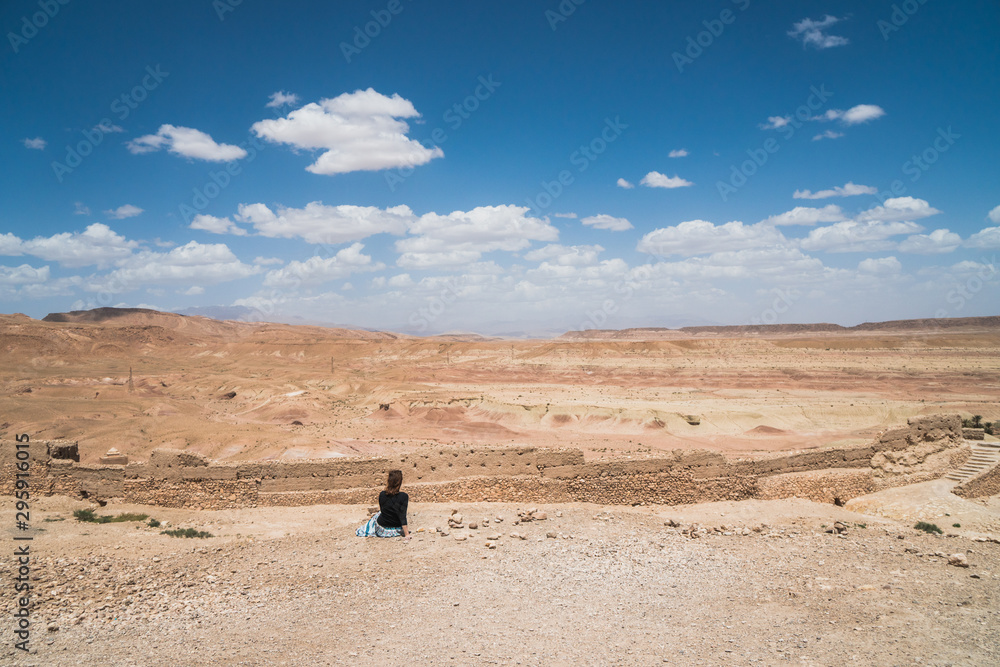 Two caucasian european white traveler girls standing on top of a cliff ...