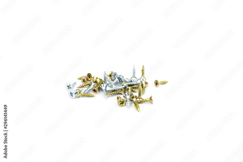 Self-tapping screws and dowels. Dowel and Macro photo a small handful ...