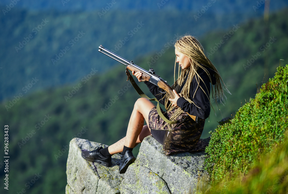 Hunting season. Hunter mountains landscape background. Sexy warrior ...