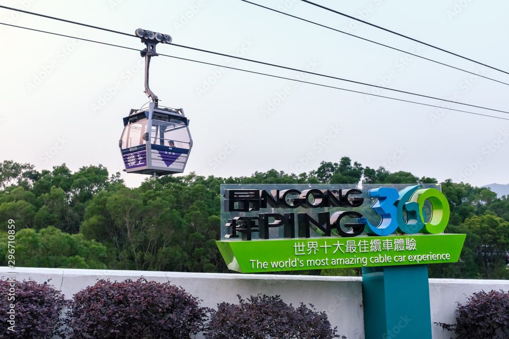 Stock-Foto „HONG KONG - OCTOBER 23, 2017_Tourists visit The Ngong Ping Village and respect The ...