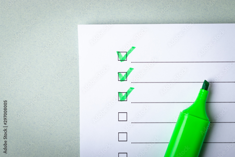 Check list and green marker Stock Photo | Adobe Stock