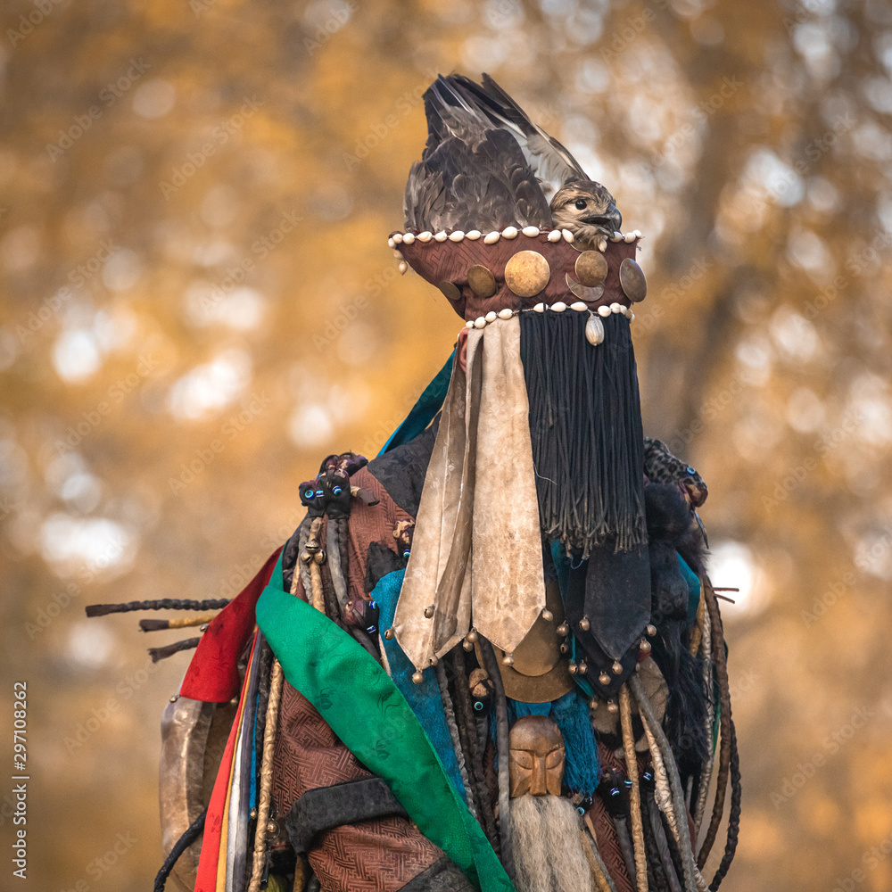 Mongolian traditional shaman performing a traditional shamanistic ...
