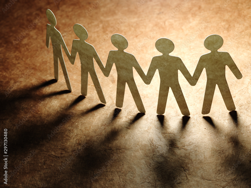 Group of paper people holding hands. Stock Photo | Adobe Stock