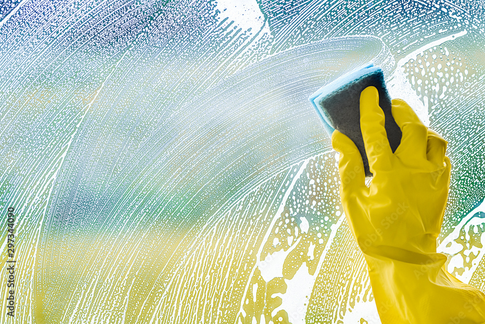 Windows cleaning, smudges or smear on glass made from foam and sponge ...