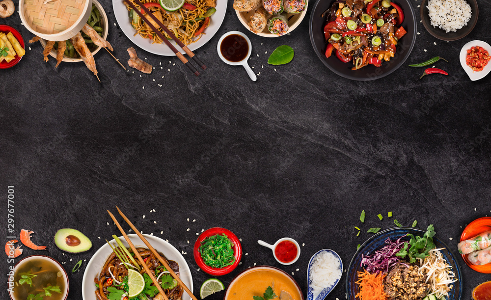 Asian food background with various ingredients on rustic stone ...