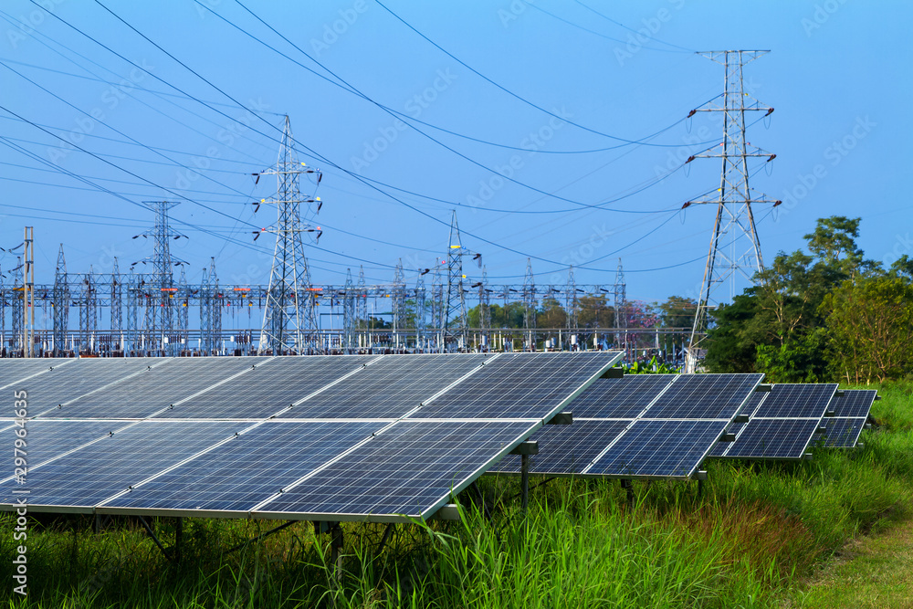 power solar panel and High voltage post in Power plant on blue sky ...