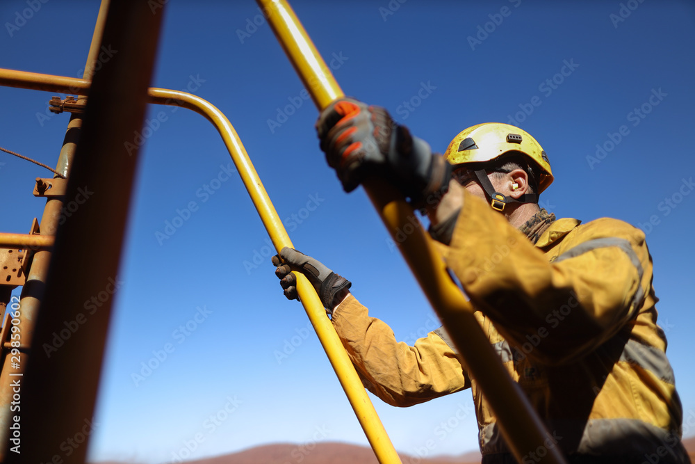 Side view good safety practice of male miner wearing safety helmet ...
