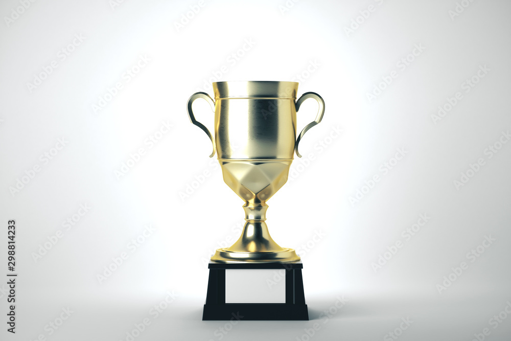 Golden winner's cup with empty plate Stock Photo | Adobe Stock