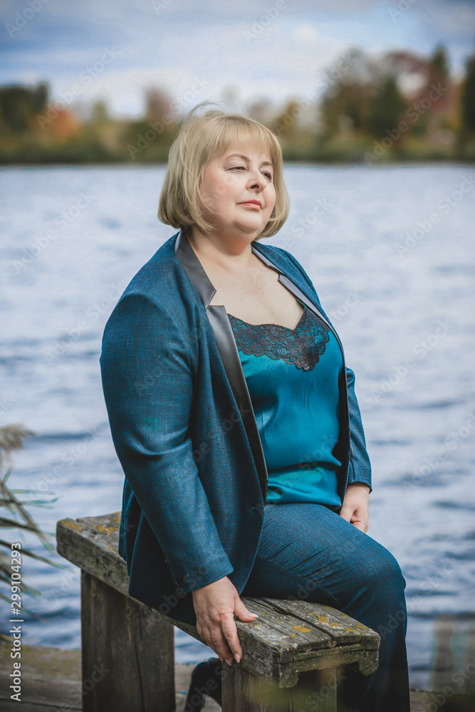 Mature plus size lady in Elegant suit at mature, older women lifestyle ...