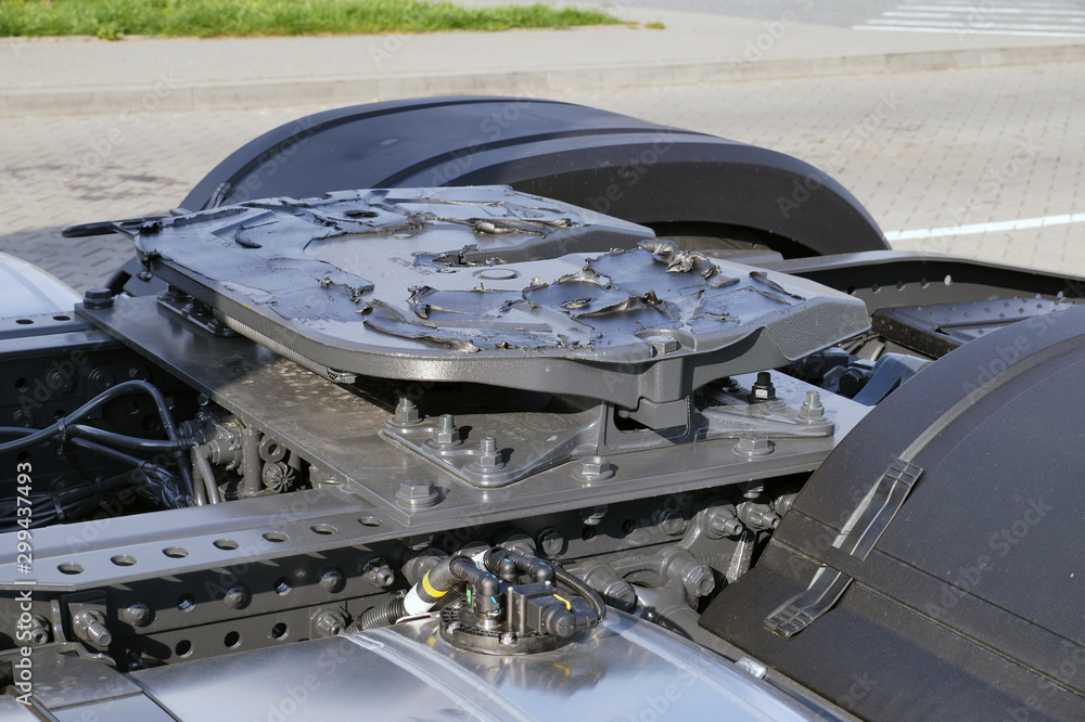 Rear of the tractor unit. Visible fifth wheel couplings are fitted to a ...