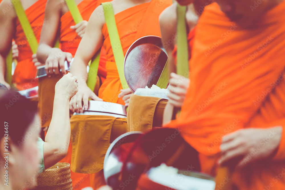 Buddhist alms giving ceremony in the morning. The tradition of giving ...