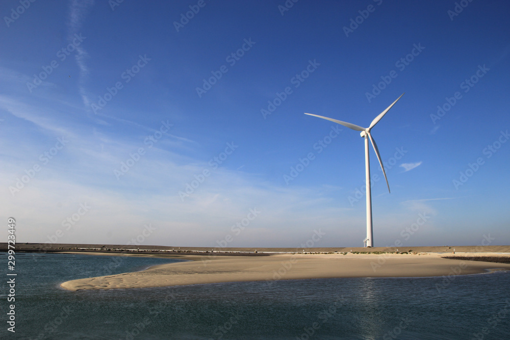 Wind turbine wings in close up in the dunes of Neeltje Jans island in ...