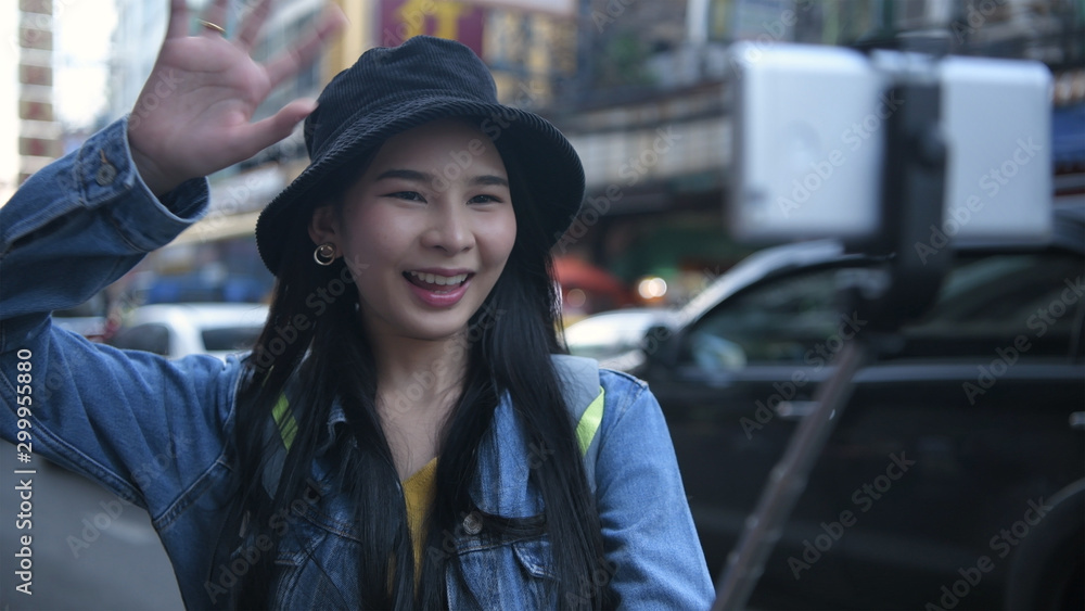 Travel concept. Beautiful girls are broadcasting live tourism in the ...