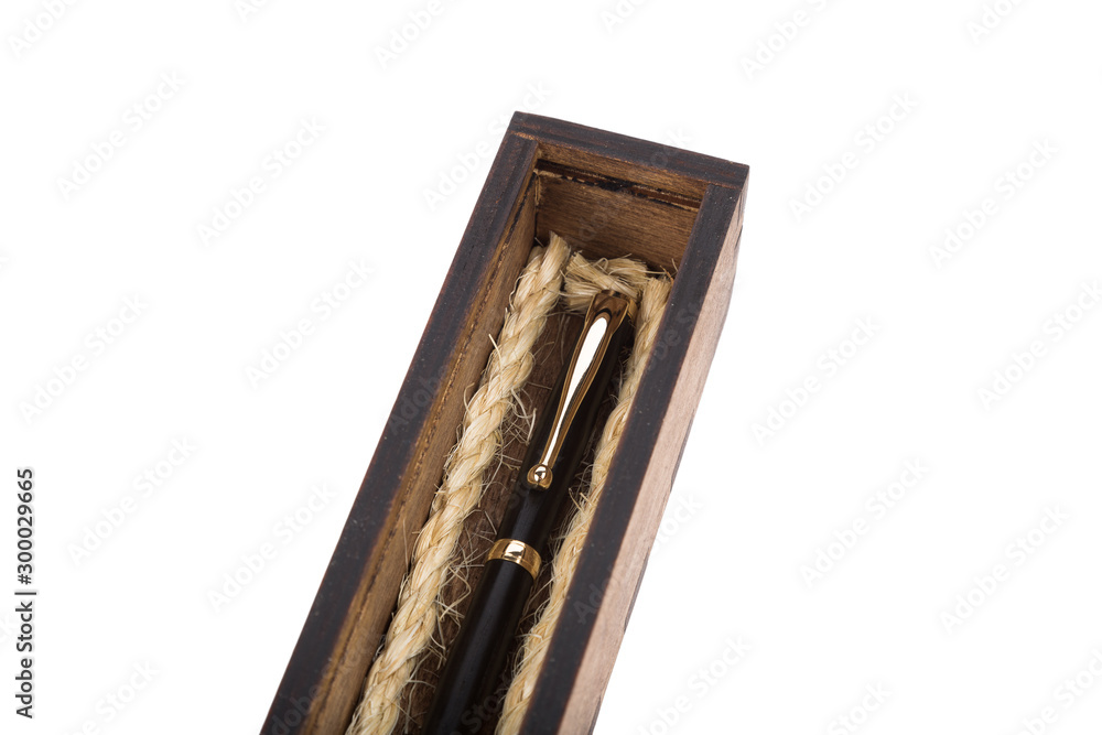 Beautiful wooden box with ballpoint pen inside on a white background ...