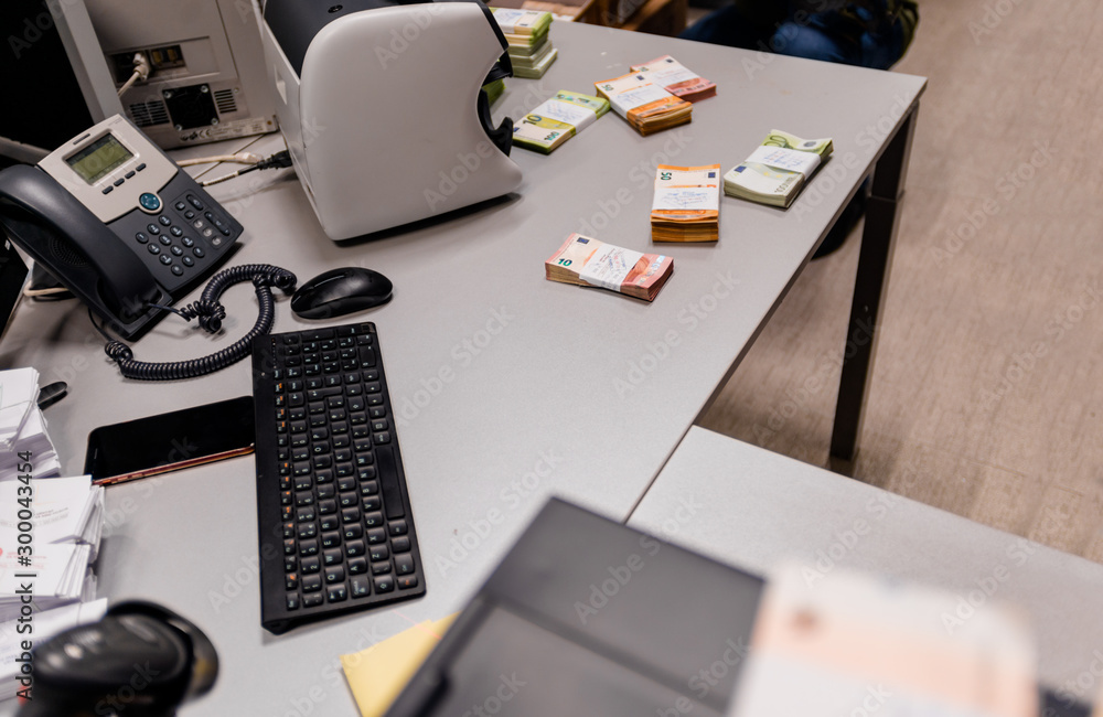 Various types of euro € banknotes on an office desk Stock Photo | Adobe ...